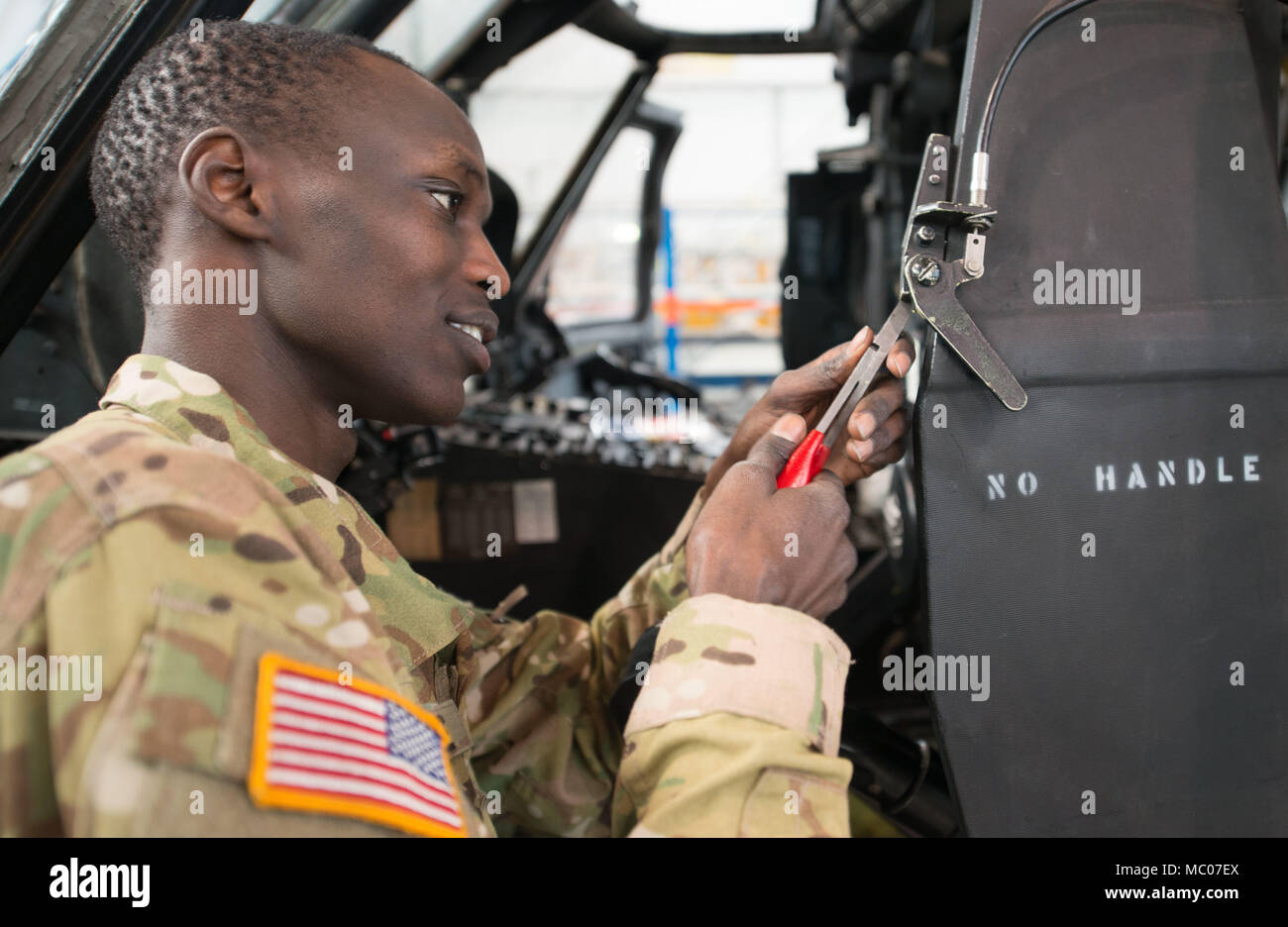 A Soldier of Delta Company, 1-214th General Support Aviation Battalion ...