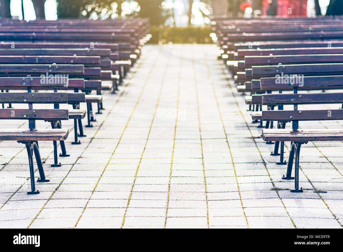Empty park benches rows in front of an open air stage. Bulgaria ...
