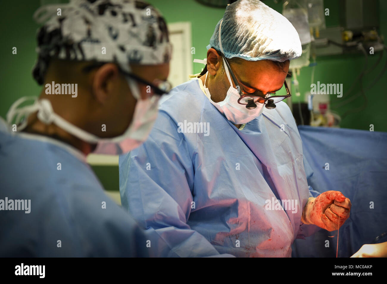 U.S. Army Lt. Col. (Dr.) Deepak Deshmukh (right center), Joint Task ...