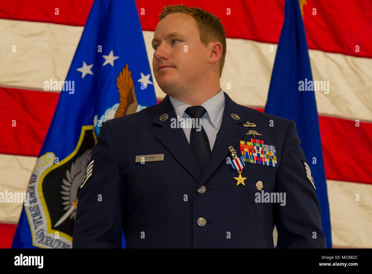 U.S. Air Force Staff Sgt. Christopher Lewis, a combat controller with ...