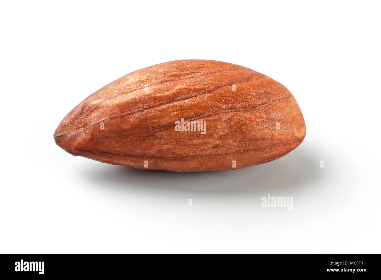 Single almond nut isolated on white background Stock Photo - Alamy