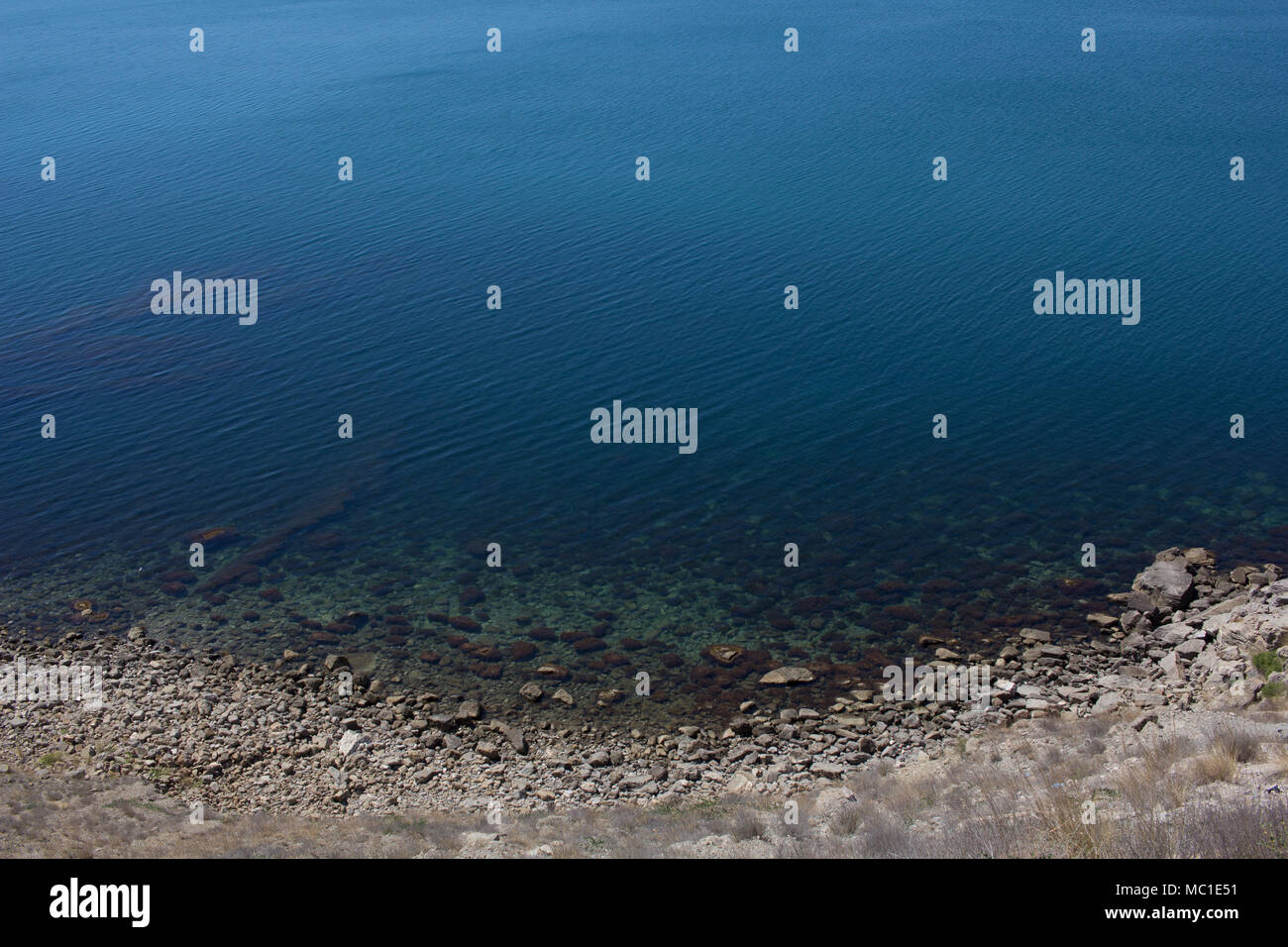 View of the calm sea from the cape. Seascape Stock Photo - Alamy