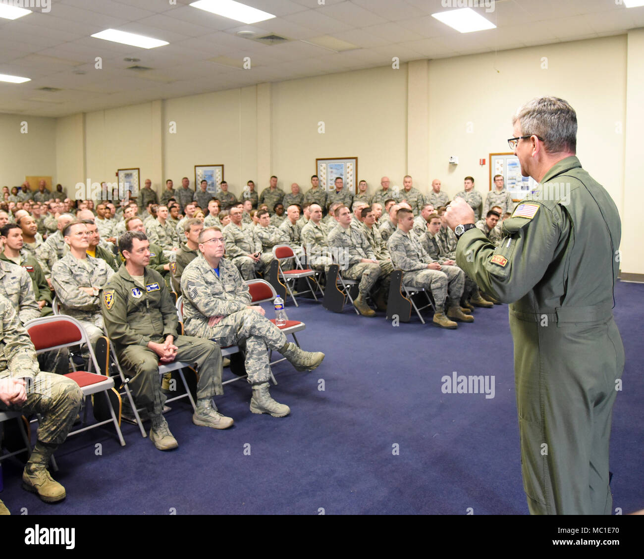 Colonel Scott Grant, 117th Air Refueling Wing Commander, speaks to the ...