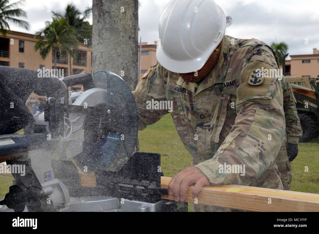 Pfc. Justin Arengo, a carpentry and masonry specialist assigned to the ...