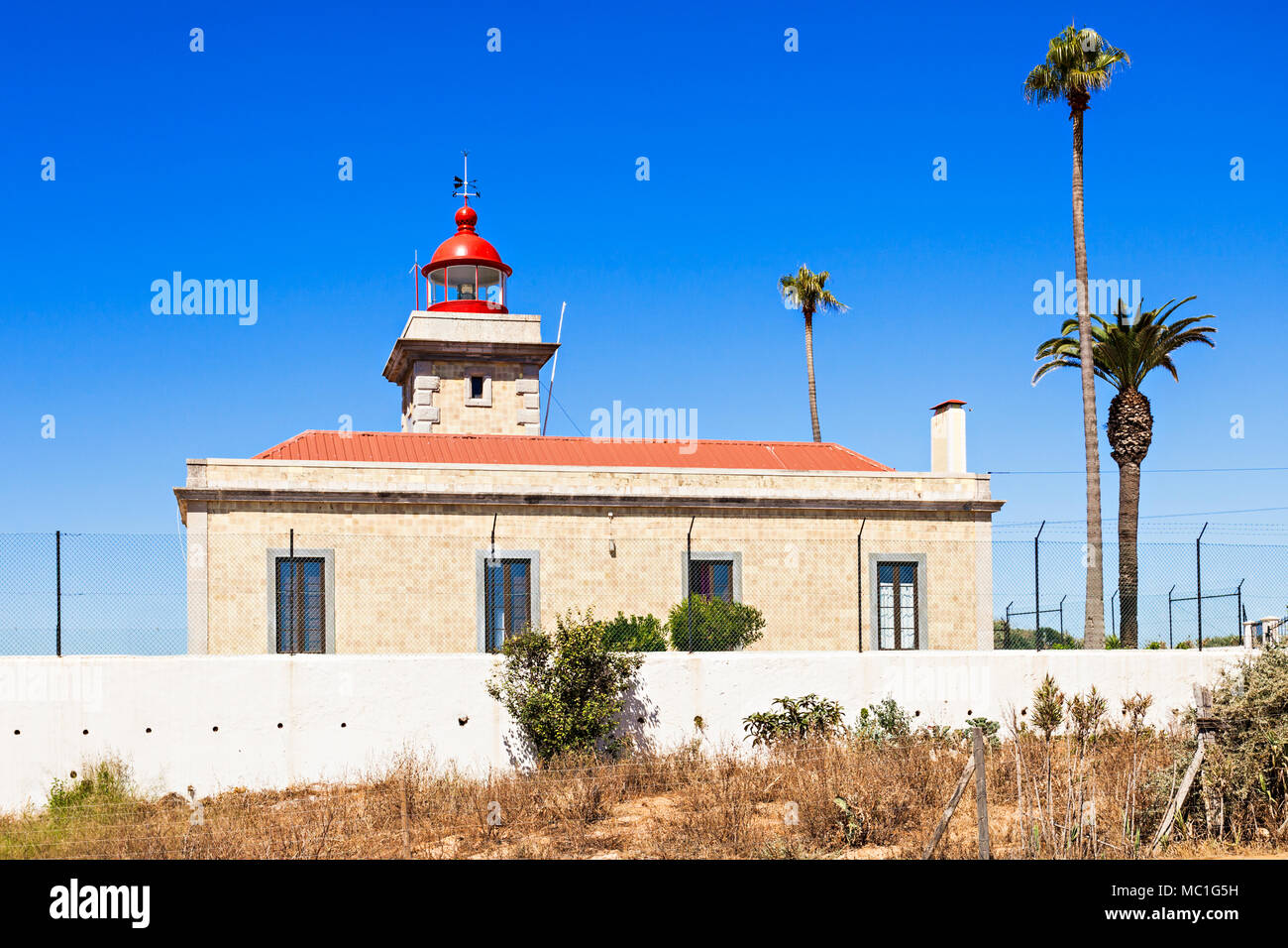 Lighthouse at Ponta da Piedade in Lagos, Algarve region in Portugal ...
