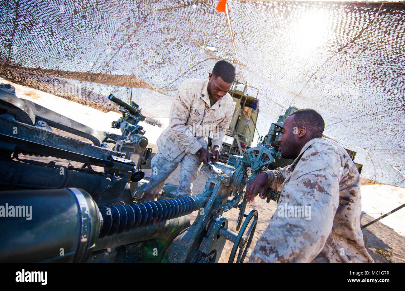 U.S. Marine Corps Sgt. Aijalon J. Langston and Sgt. Adrian Scott ...