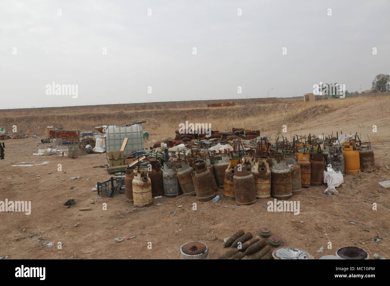 Improvised explosive devices sit at an unexploded ordinance device ...