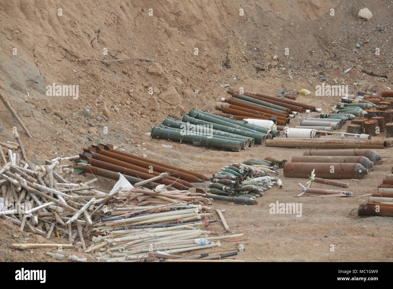 Improvised explosive devices sit at an unexploded ordinance device ...
