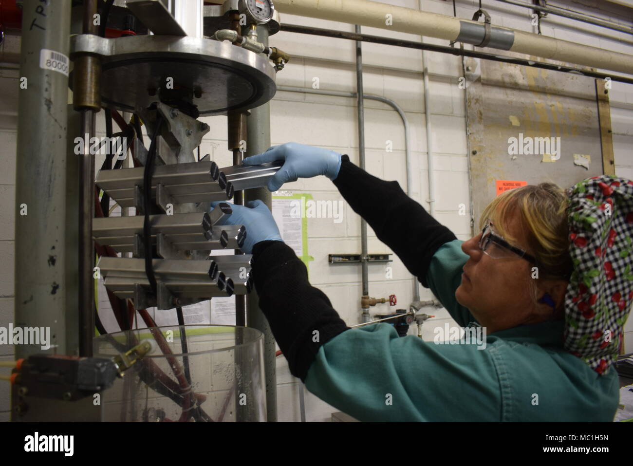 Crane Army Ammunition Activity employees produce MJU 61 A/B flares for ...