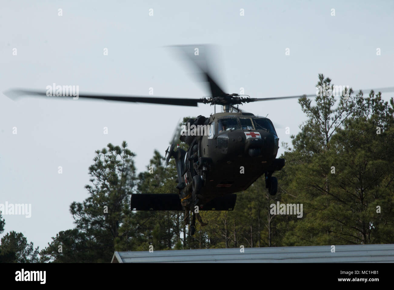 A 1st Security Force Assistance Brigade Soldier acting as a casualty ...