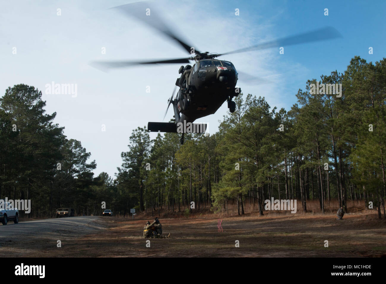 A 1st Security Force Assistance Brigade Soldier acting as a casualty ...