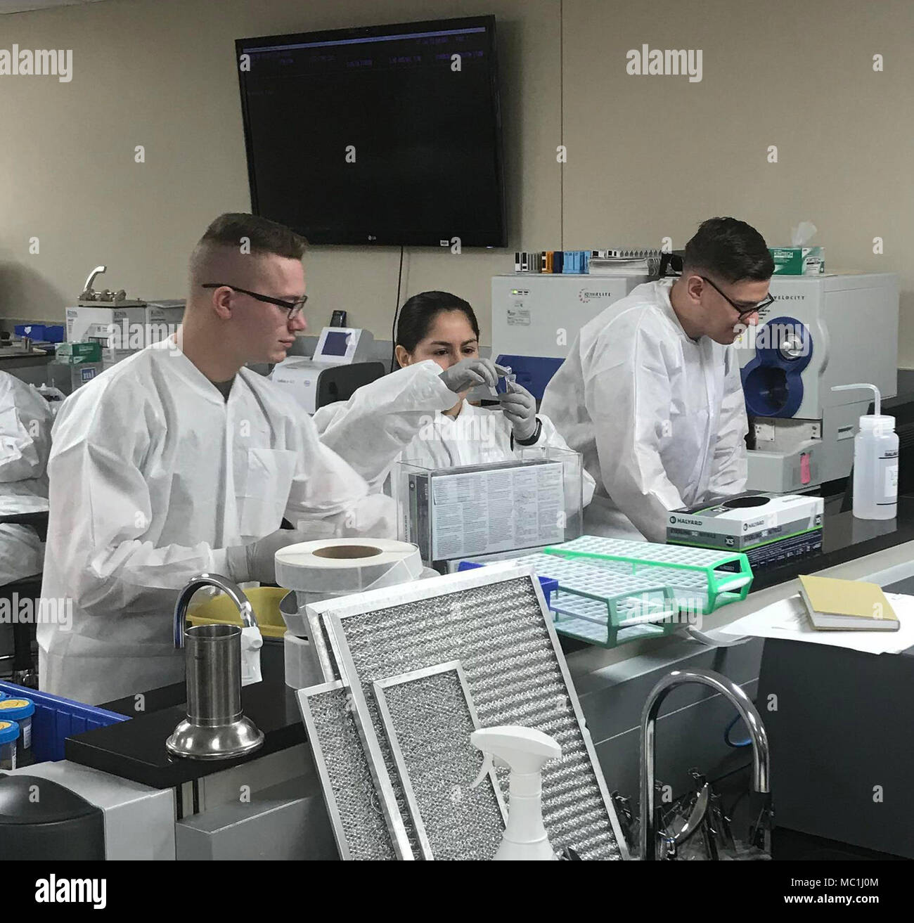 Pfcs. Austin Lewis, Charlene Perez and Jake Serrano-McEwen train in the ...