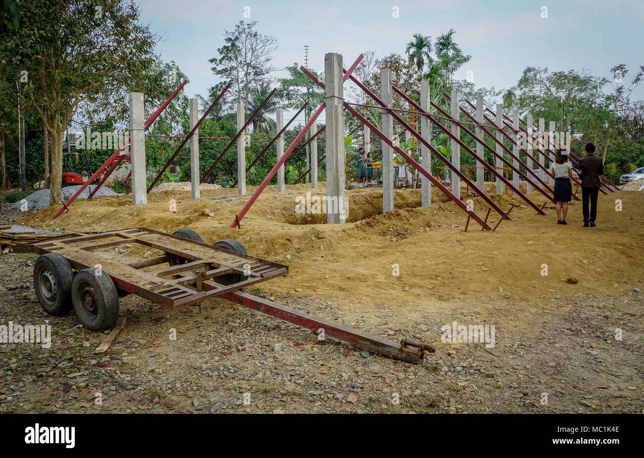 The columns for a multifunctional building stand raised after a pillar ...