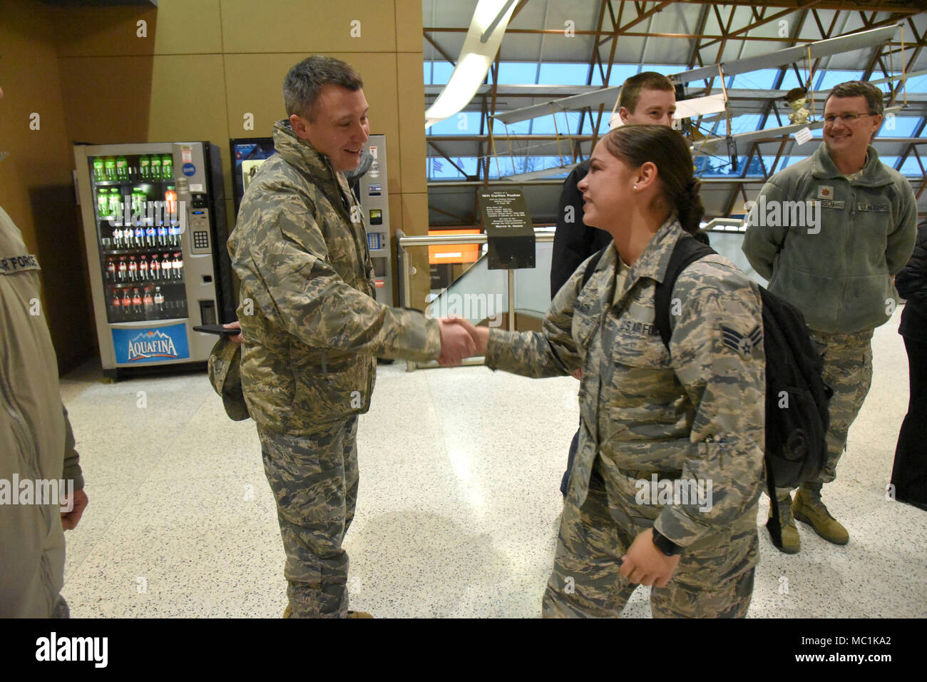 Col. Britt Hatley, the 119th Wing commander, left, greets Airman 1st ...