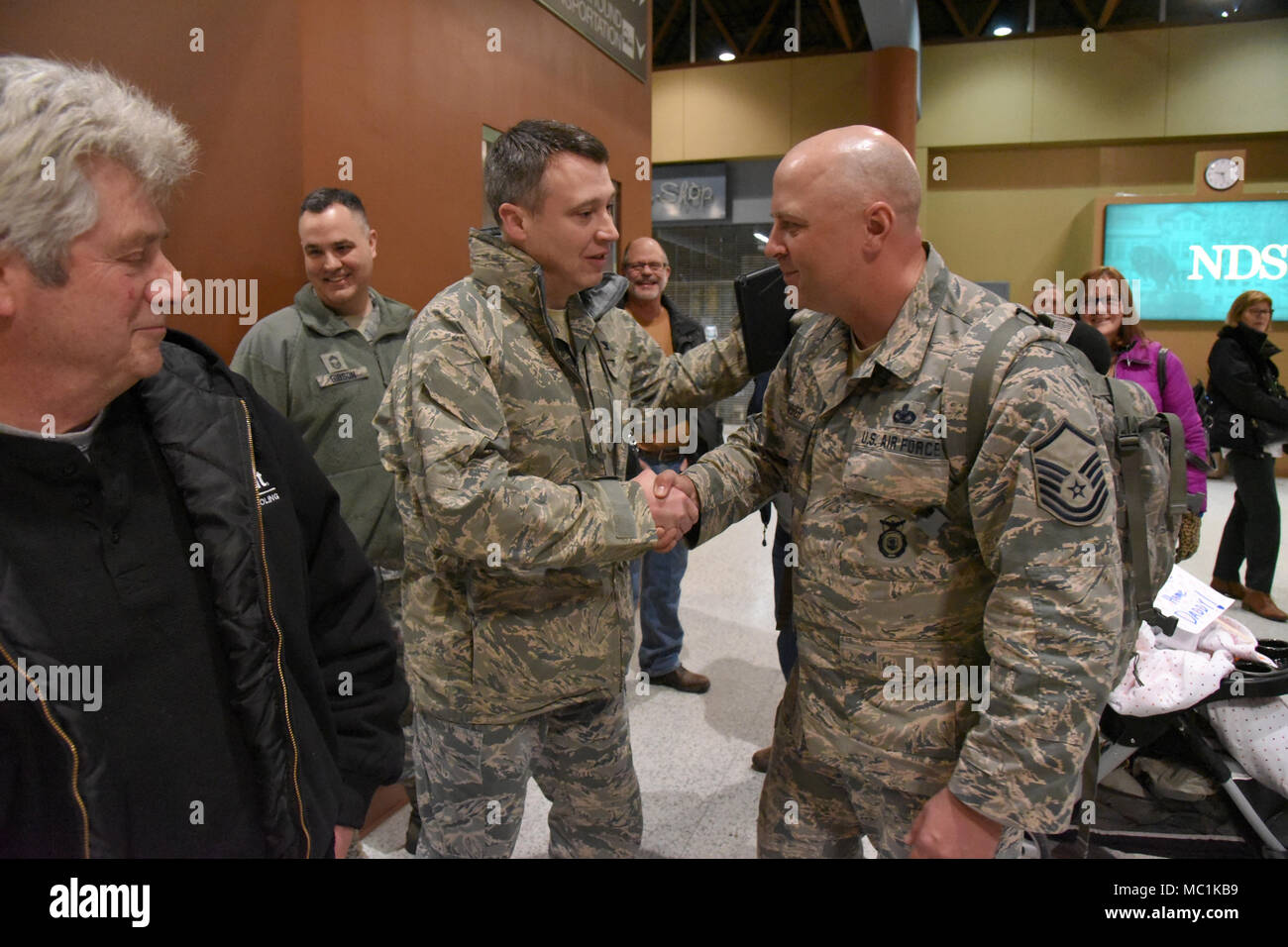 U.S. Air Force Col. Britt Hatley, the 119th Wing commander, left ...