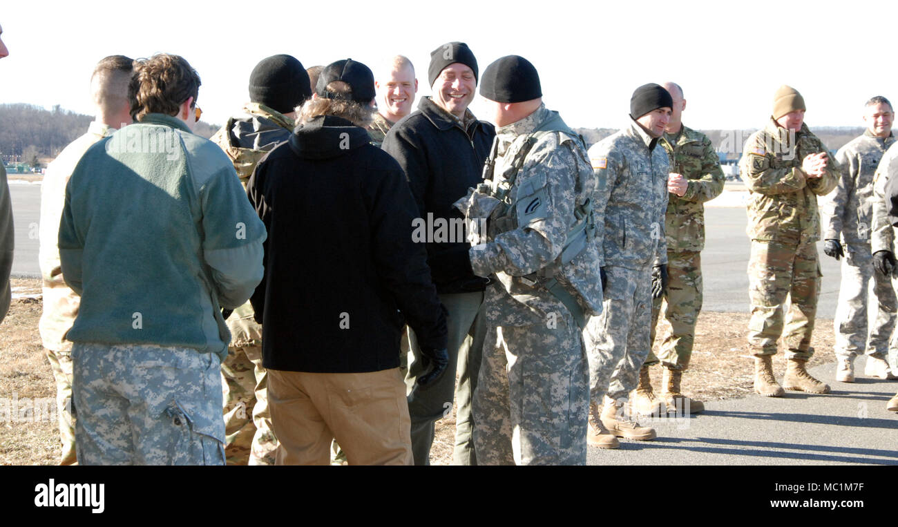 New York Army National Guard Soldiers greet Chief Warrant Officer 5 ...