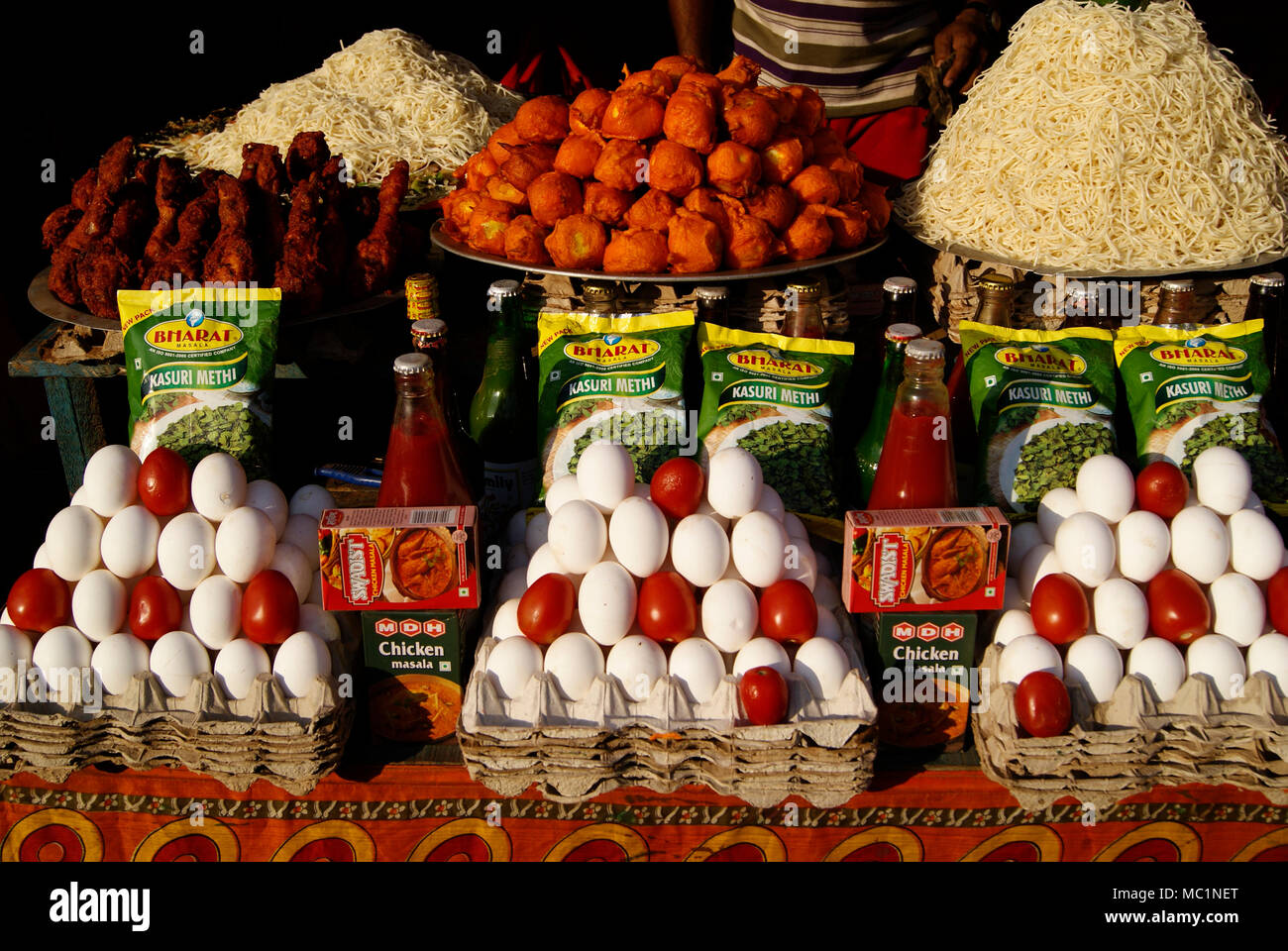 Street food Stall different spicy snacks and noodles with eggs and ...