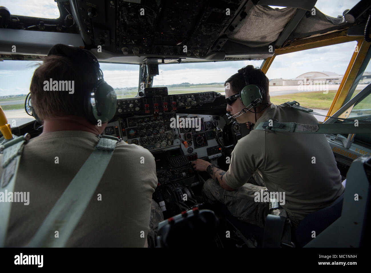 U.S. Air Force Staff Sgt. Christopher Anderson (left) and Senior Airman ...