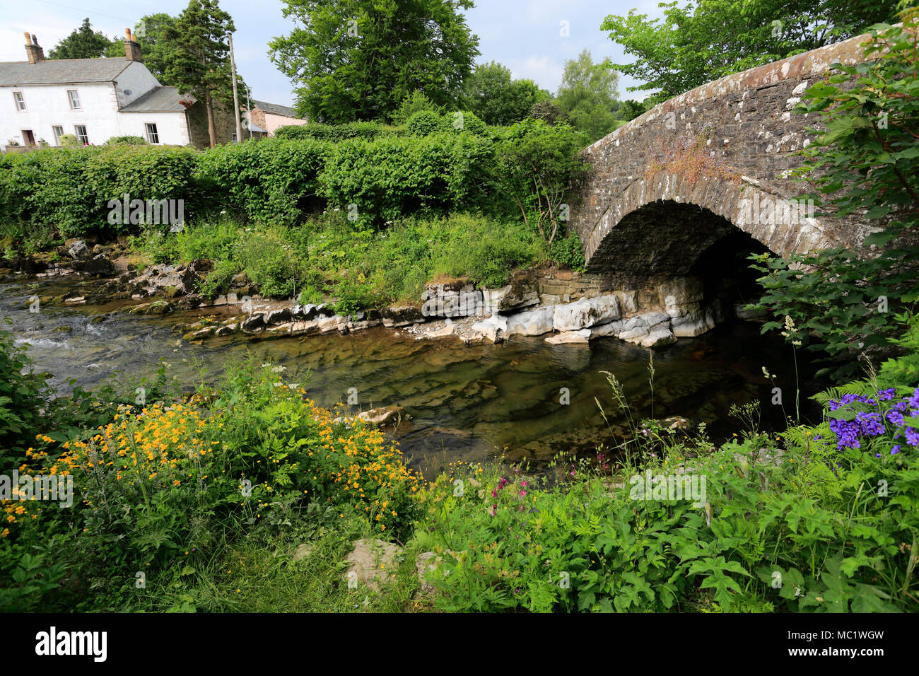 Summer view of the River Caldew, Caldbeck village, Lake District ...