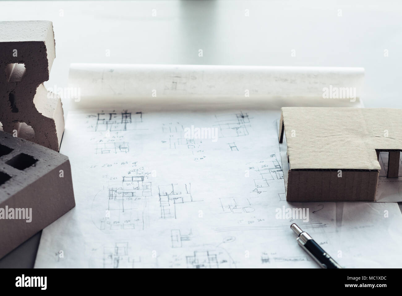 Architect desk with handdrawing sketches, pencil and brick blocks Stock ...