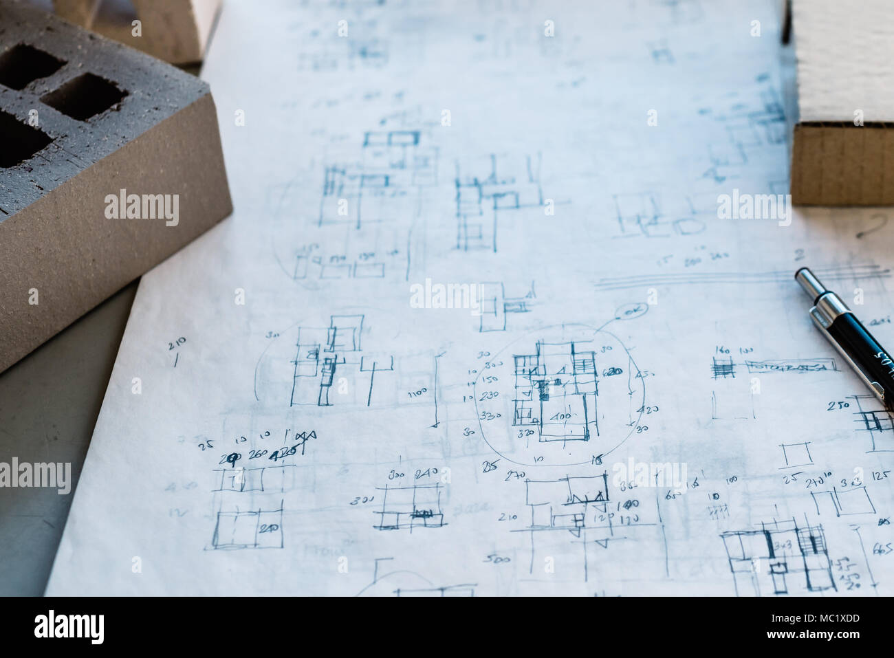 Architect desk with handdrawing sketches, pencil and brick blocks Stock ...