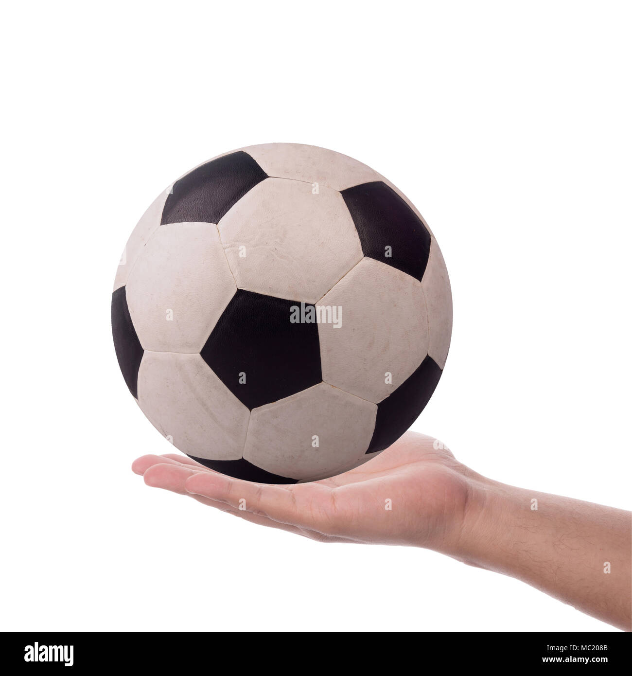 male hand holding football isolated on white Stock Photo - Alamy