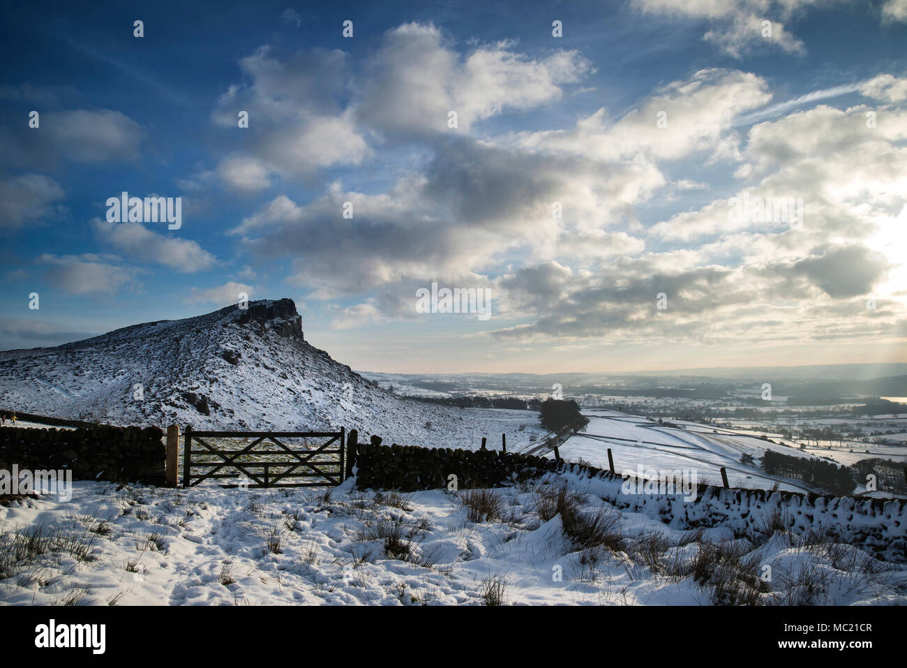 Winter sky over snow covered Winter landscape in Peak District at ...