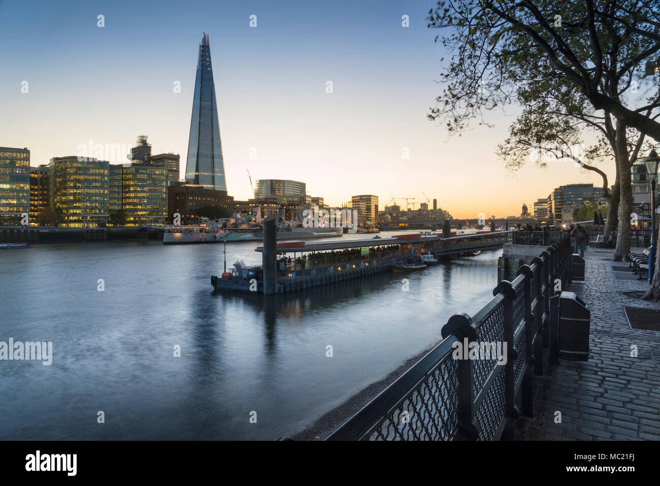 Stunning London City skyline landscape at night with glowing city ...