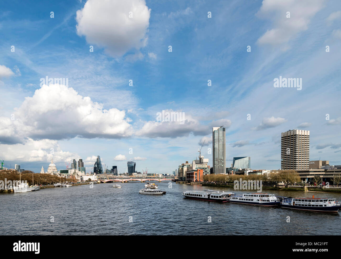 Landscape image view from Waterloo bridge along River Thames towards ...