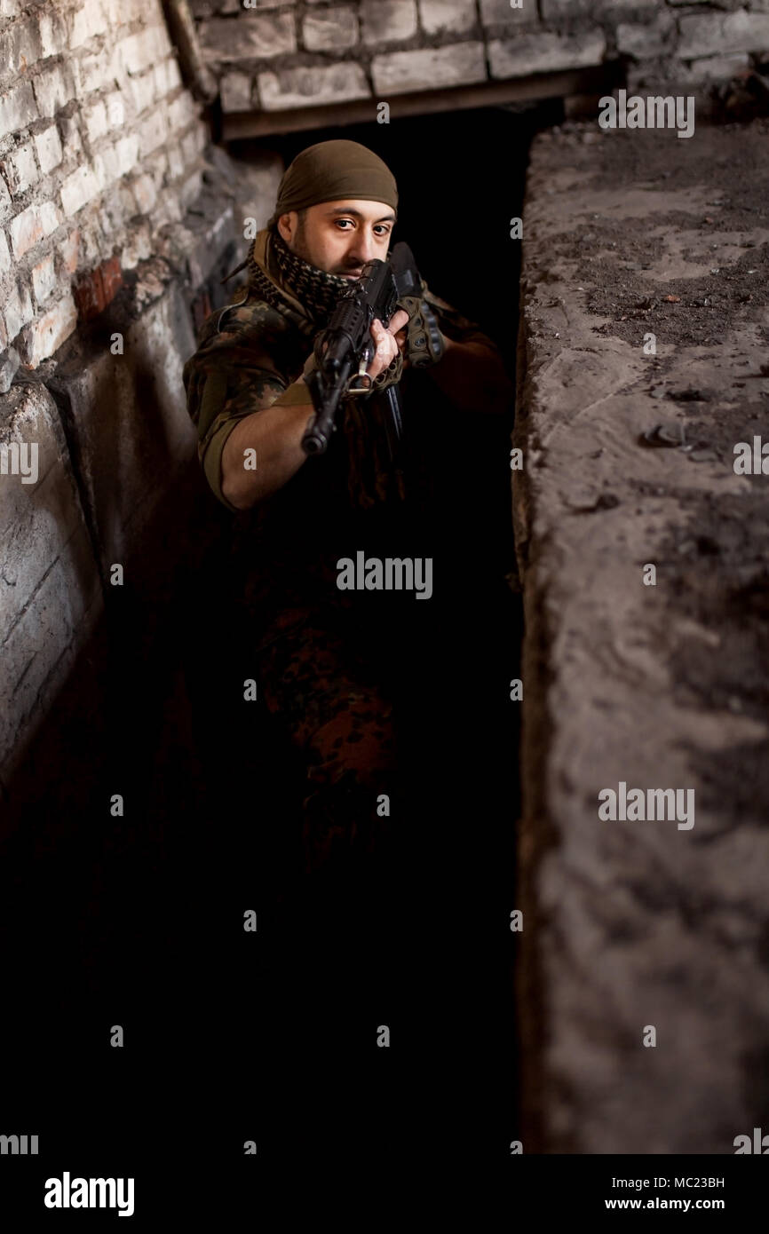 Arab soldier aiming with Kalashnikov AK-47 assault rifle Stock Photo ...