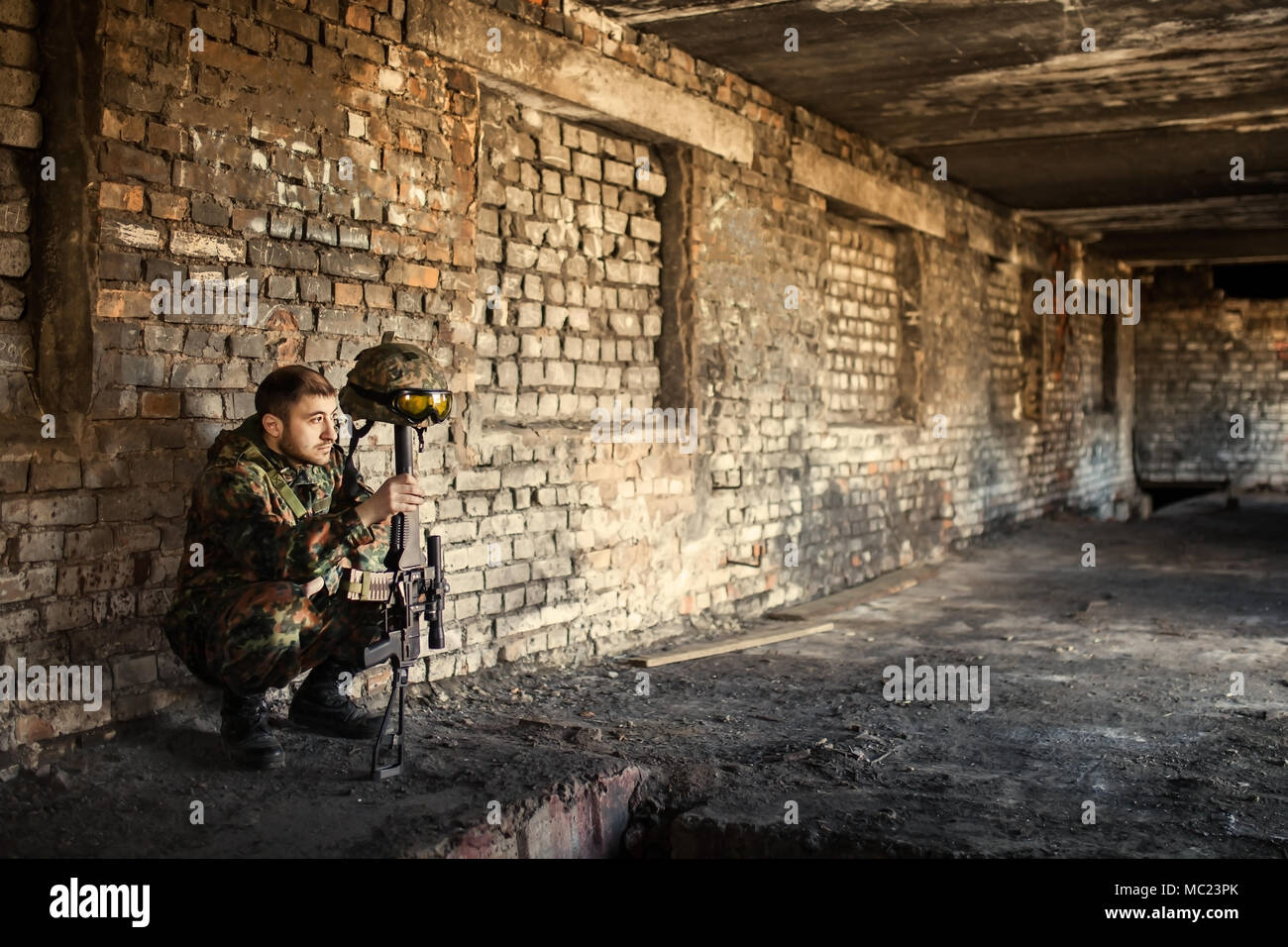 A thoughtful soldier, resting from a military operation Location of ...