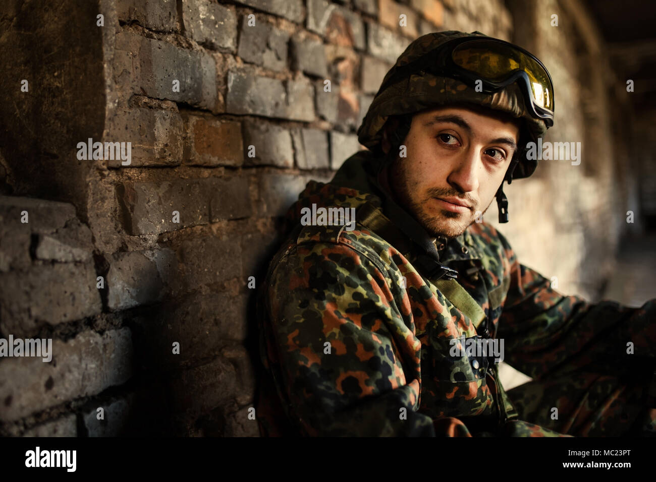 A thoughtful soldier, resting from a military operation Location of ...