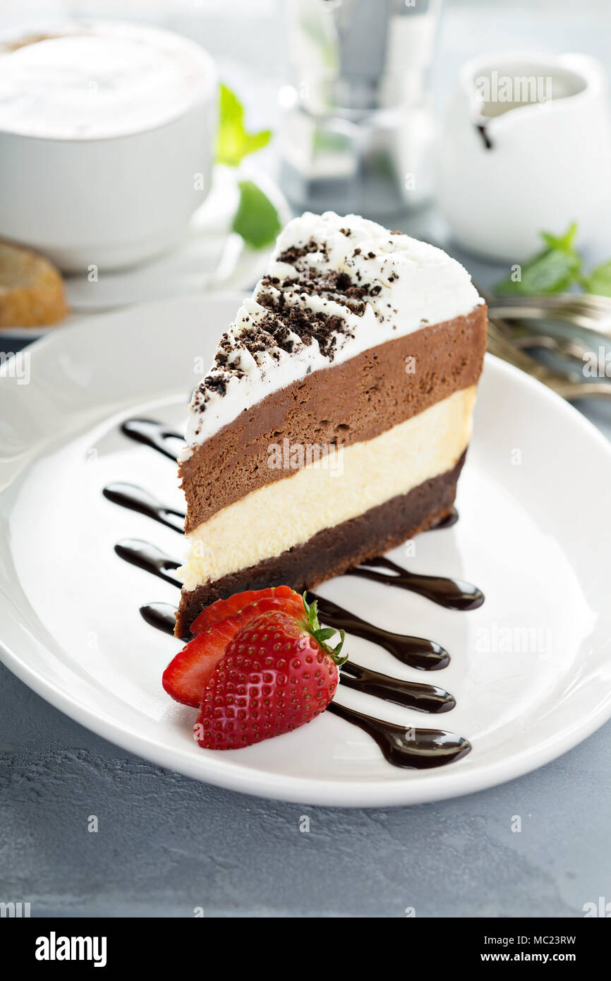 Three chocolate layered mousse cake Stock Photo - Alamy
