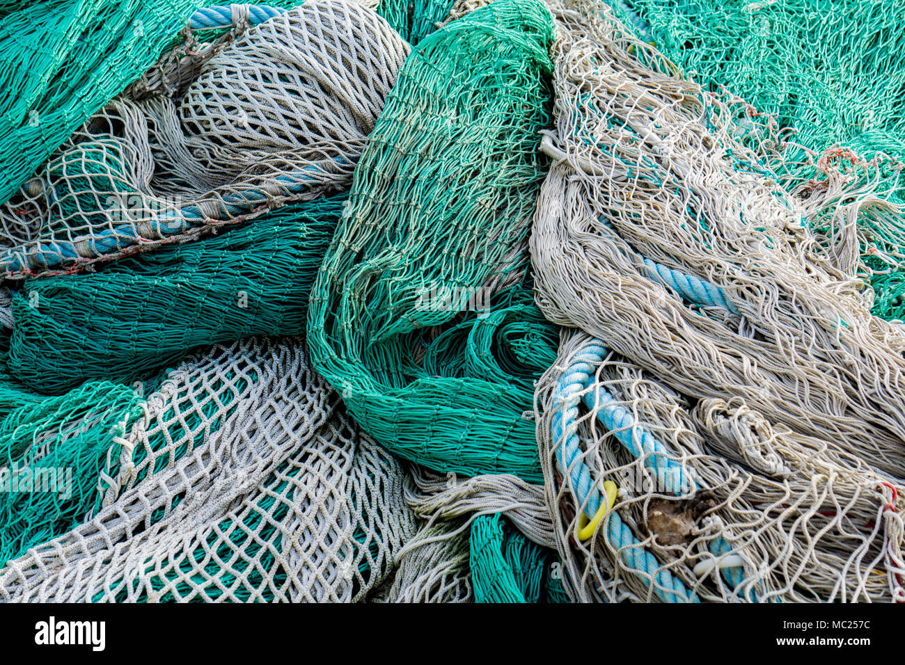 Closeup view at the fishing net on the boat Stock Photo - Alamy