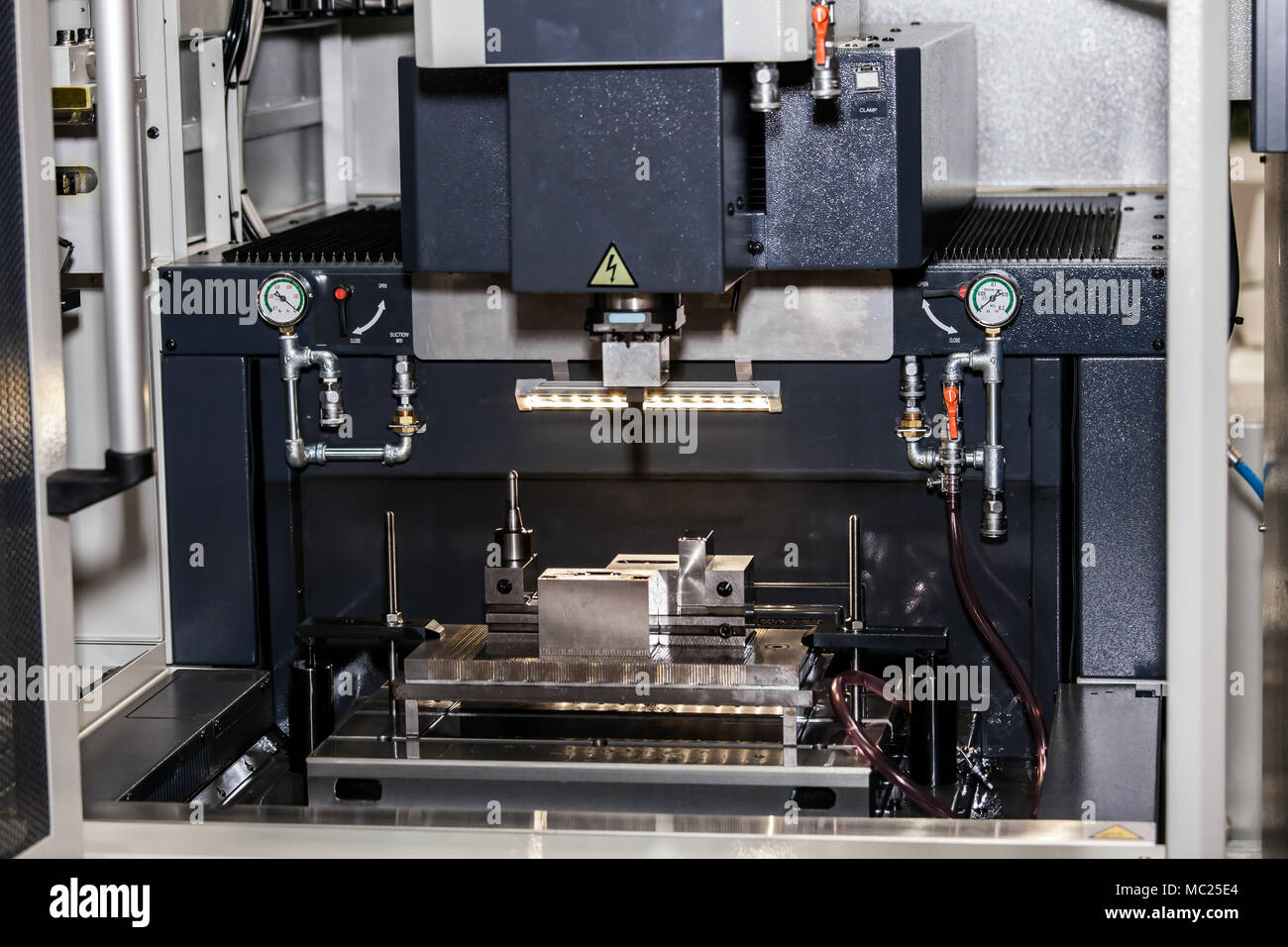 Electroerosion sinking machine Stock Photo - Alamy