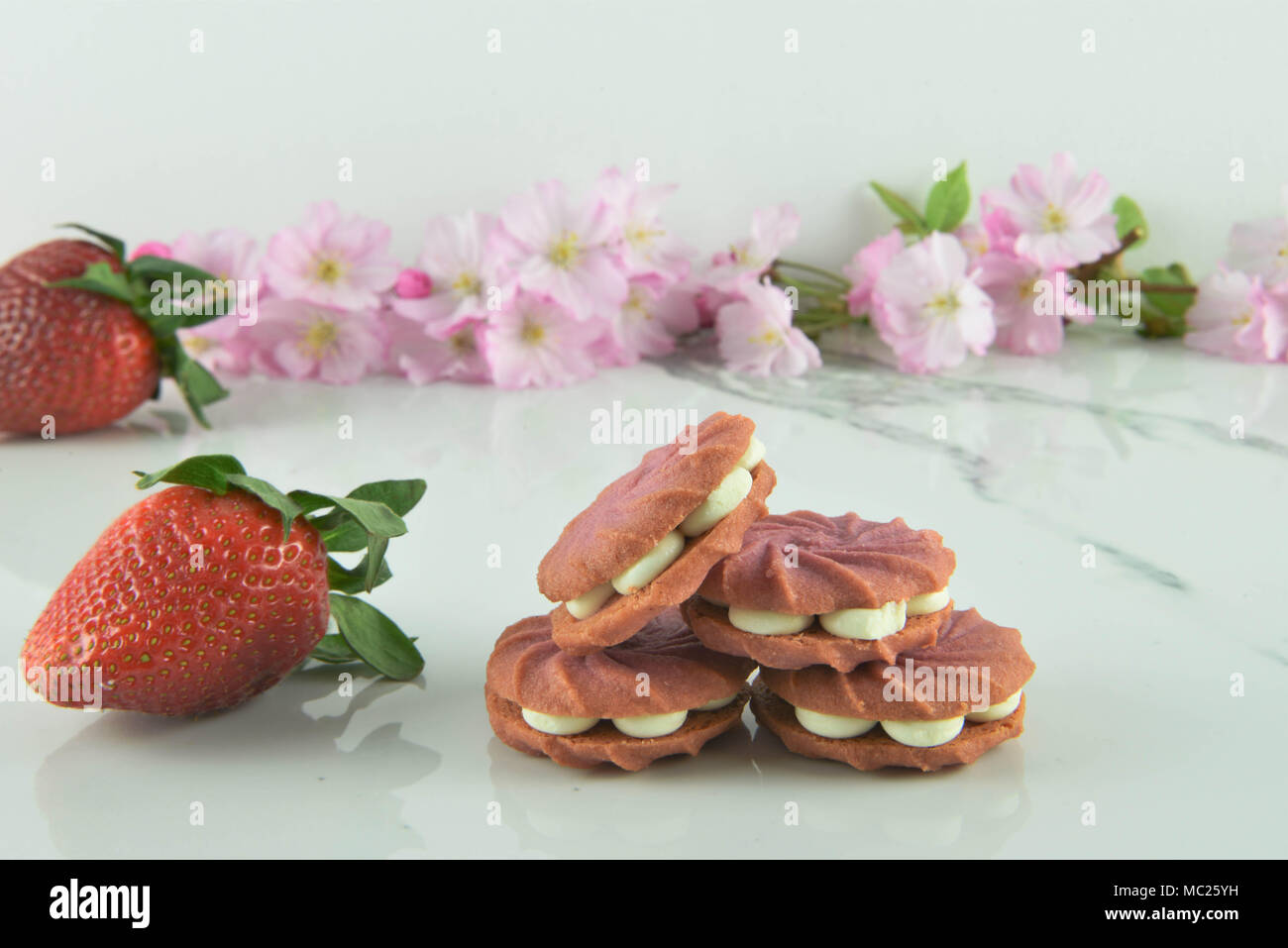 Pink and white biscuits hi-res stock photography and images - Alamy