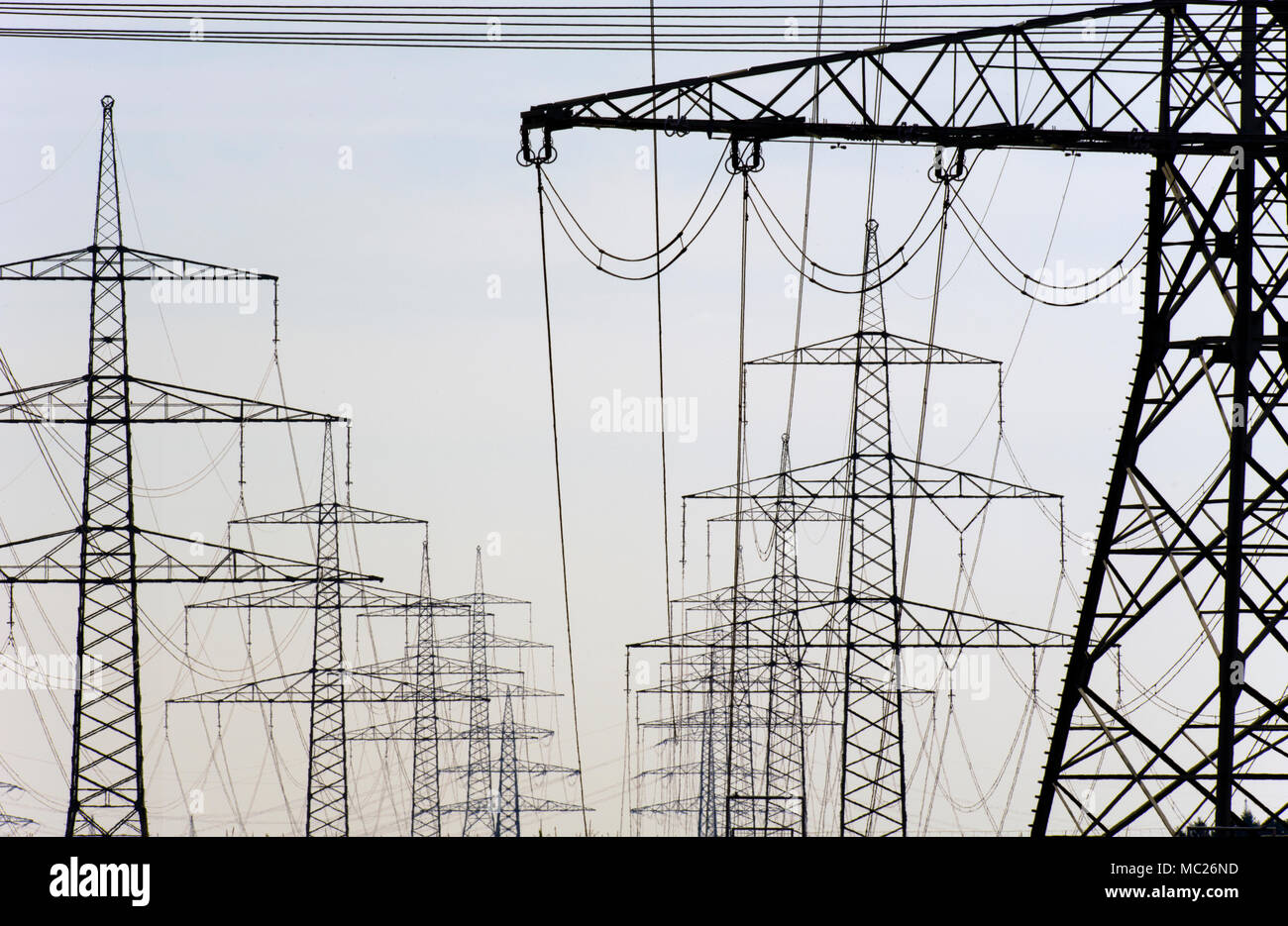 many high-voltage pylons for transporting electricity from a power ...
