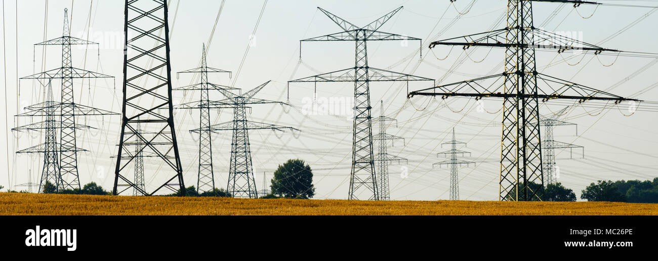 many high-voltage pylons for transporting electricity from a power ...