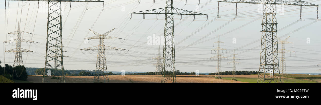 many high-voltage pylons for transporting electricity from a power ...