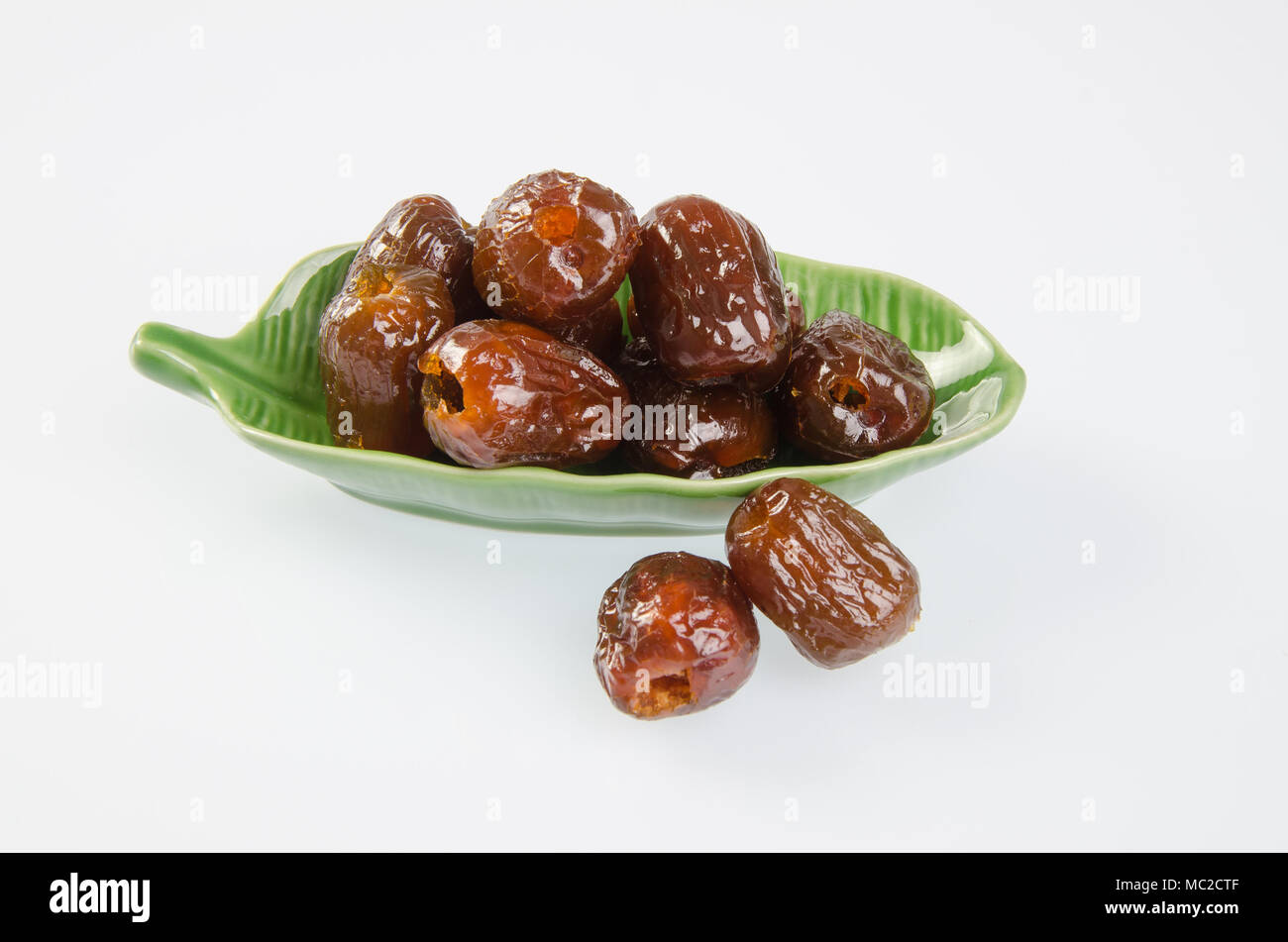Dried preserved. Sweet syrup monkey apple or Chinese date on the ...