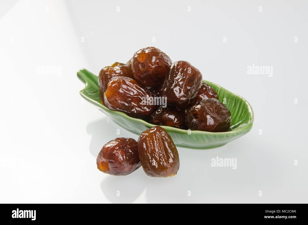 Dried preserved. Sweet syrup monkey apple or Chinese date on the ...
