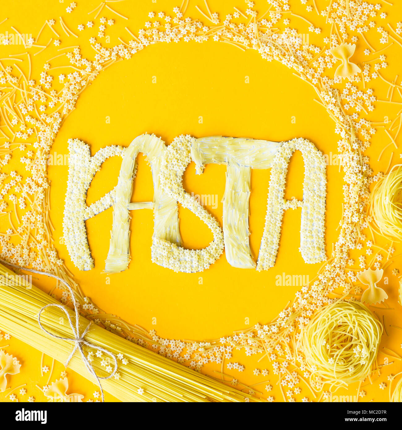 The word pasta is laid out in voluminous letters from small raw ...