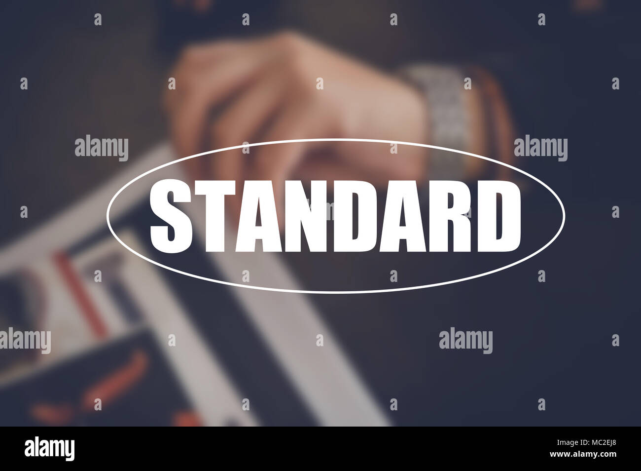 Standard word with blurring background Stock Photo - Alamy