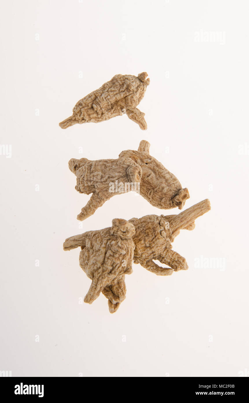 ginseng. Dried Ginseng On Background Stock Photo - Alamy