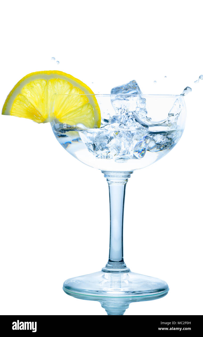 ice cube splash with lemon isolated on white background Stock Photo - Alamy