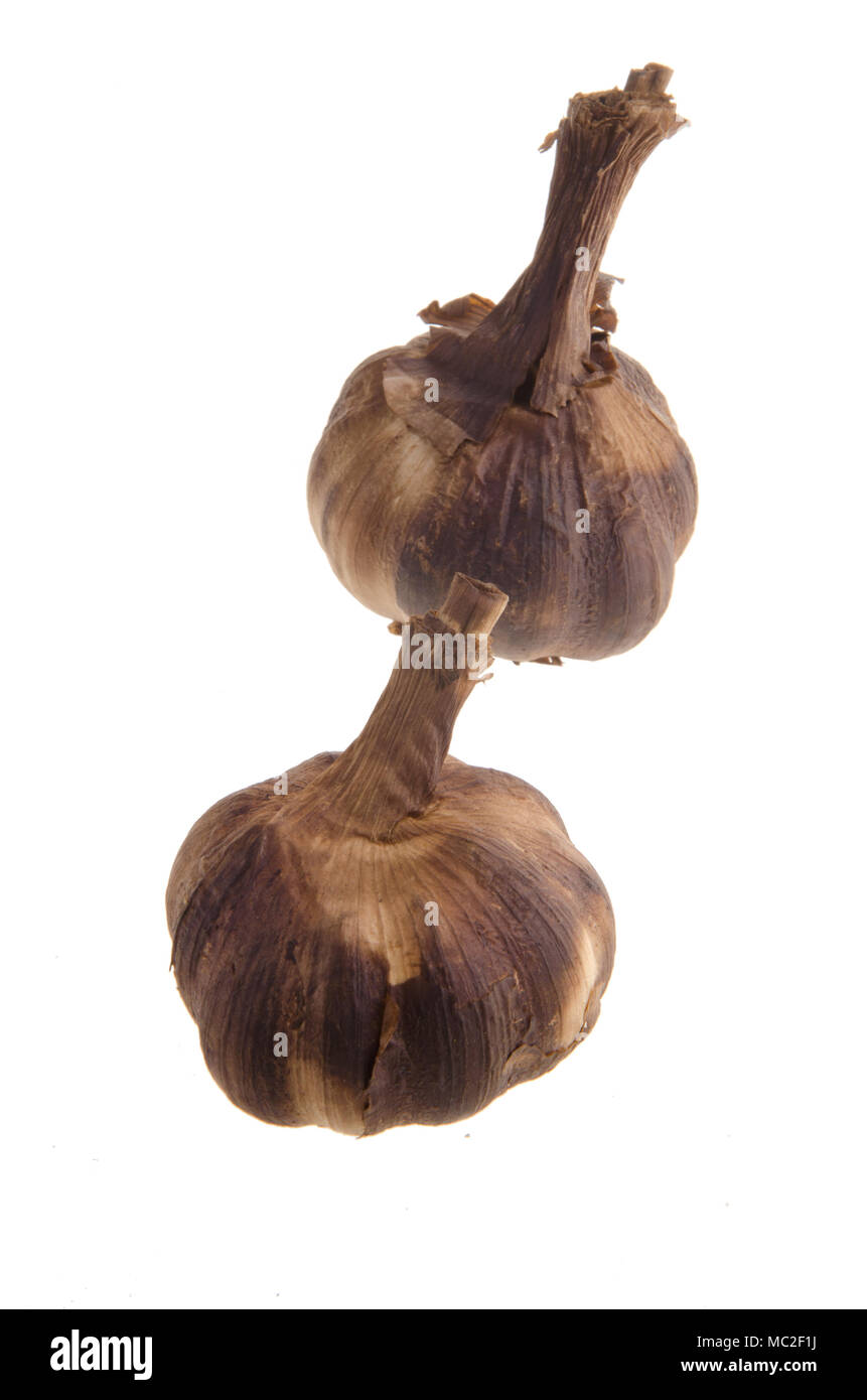Garlic. Bulb / Head of garlic on background Stock Photo - Alamy