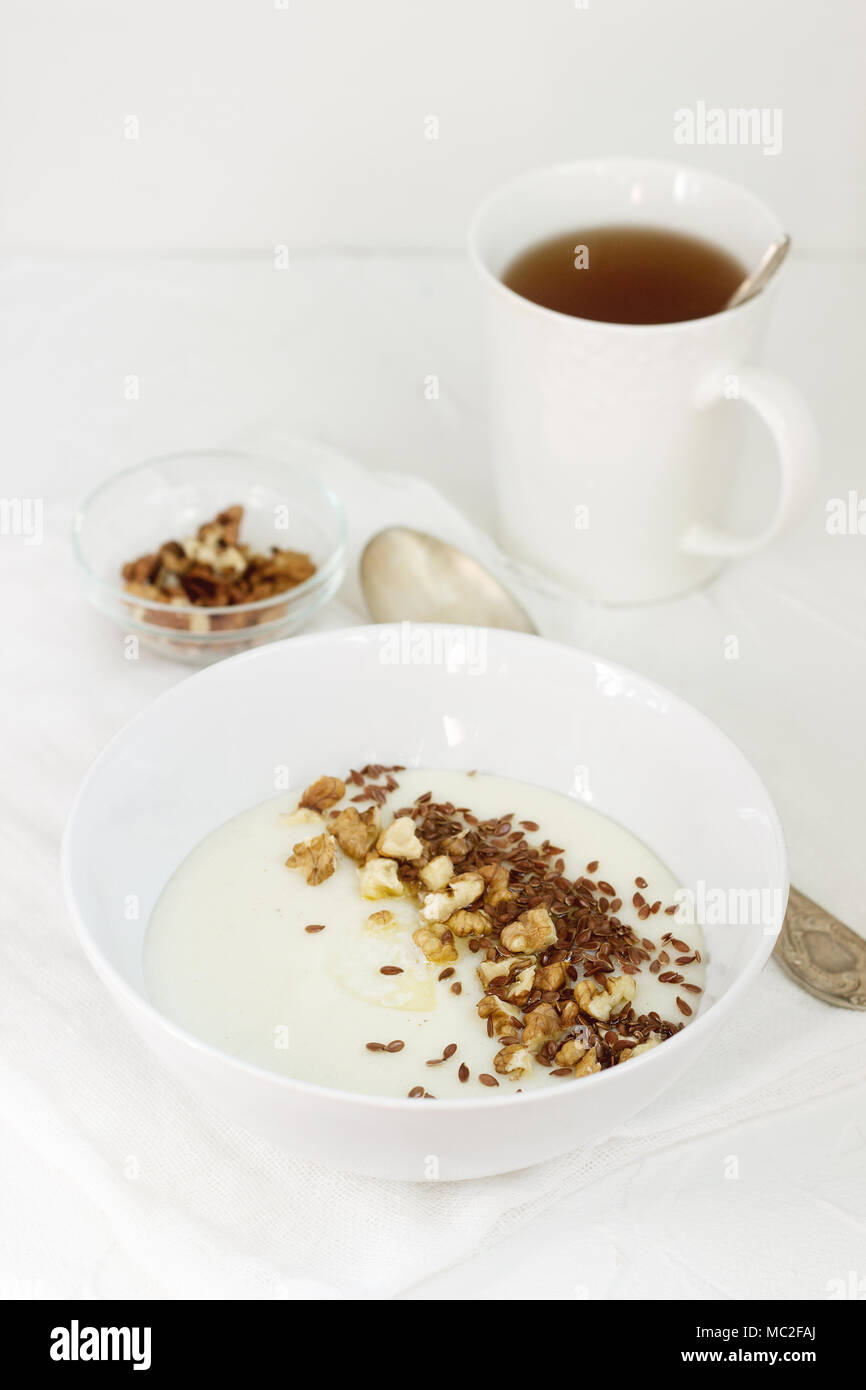 Traditional semolina porridge with butter, nuts and flax seed. A useful ...