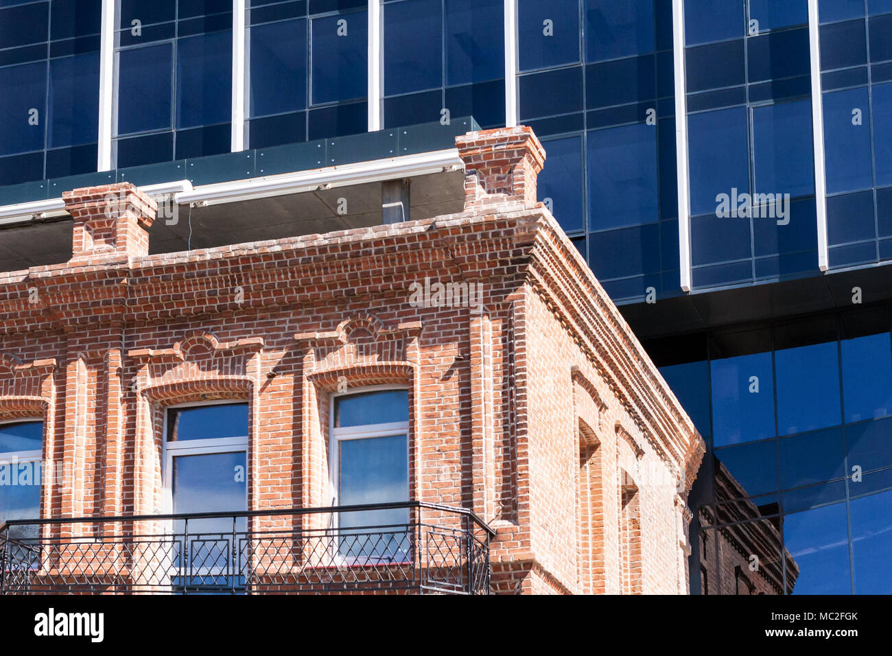 Modern building behind old building hi-res stock photography and images ...