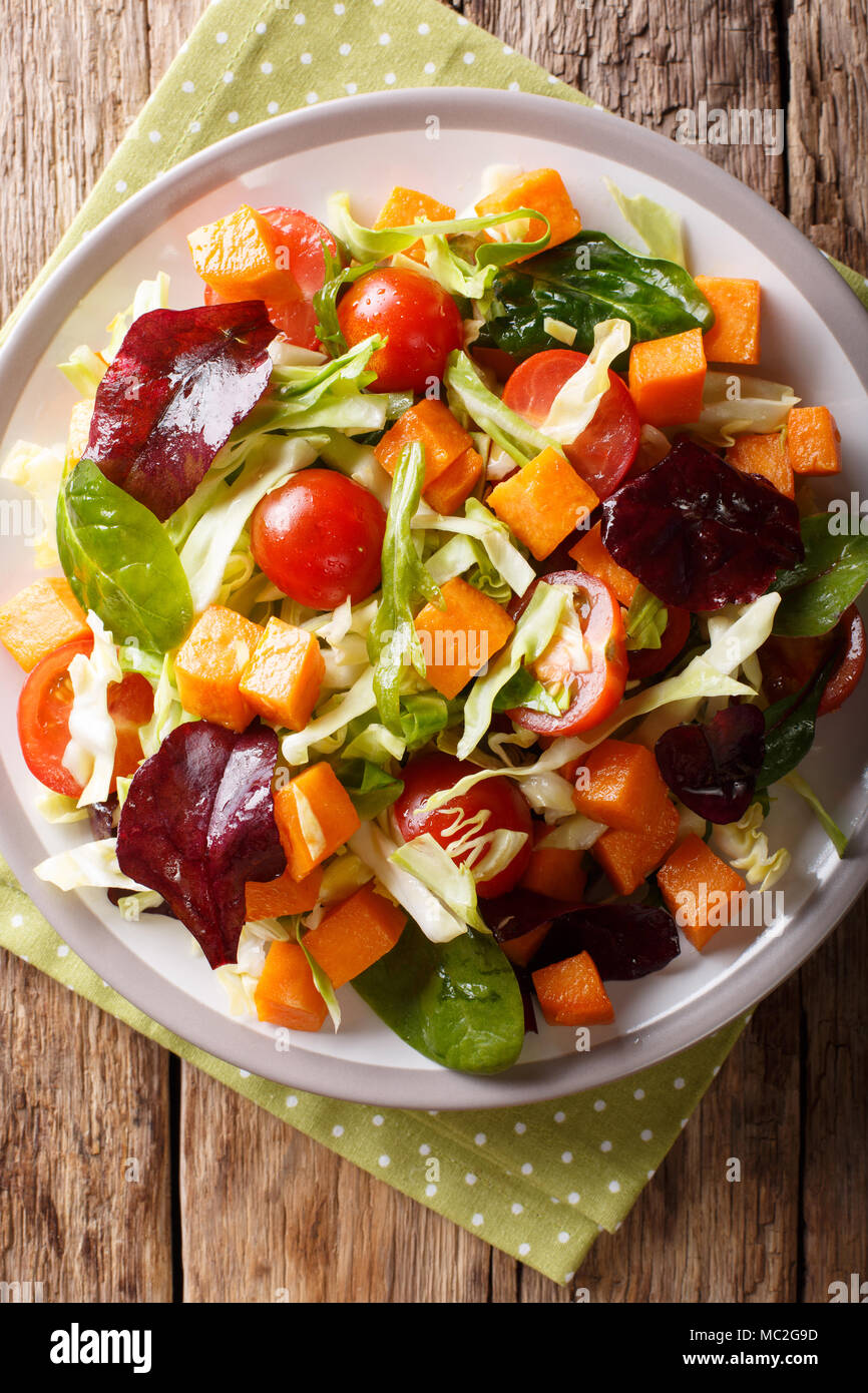 healthy food: vegetarian salad of sweet potato with fresh vegetables ...