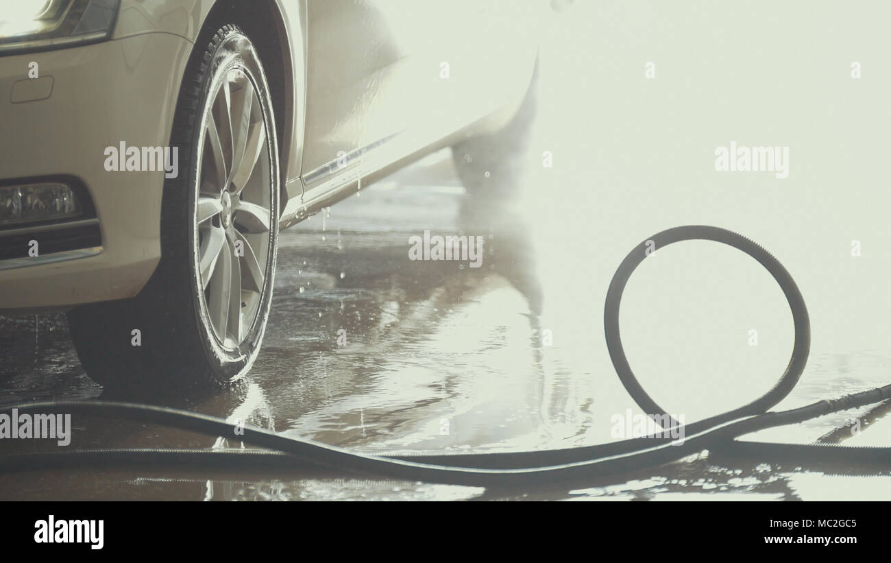 The car is covered by the water after car washing Stock Photo - Alamy